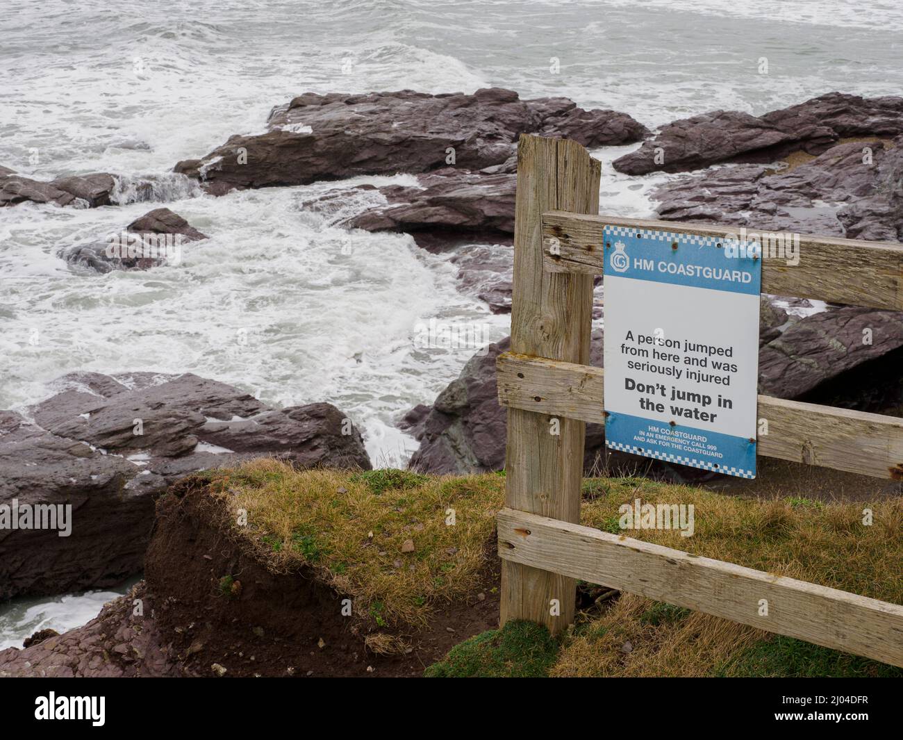 HM Coastguard warning sign, Polzeath, Cornwall, UK Stock Photo - Alamy