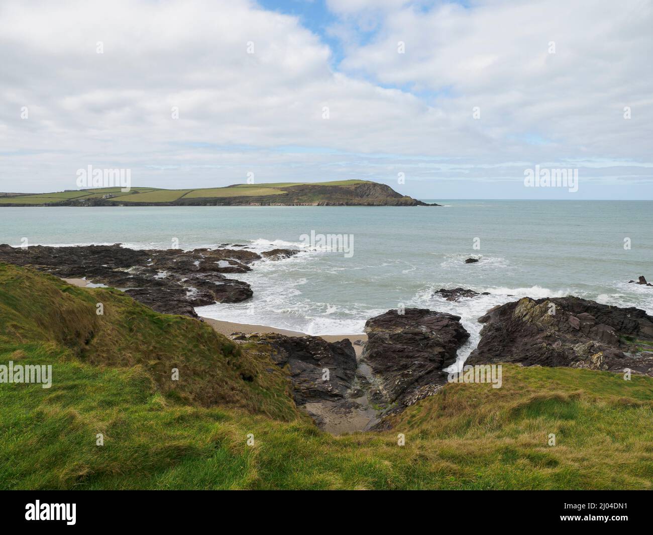View across the Camel Estuary to Stepper Point, Polzeath, Cornwall, UK ...