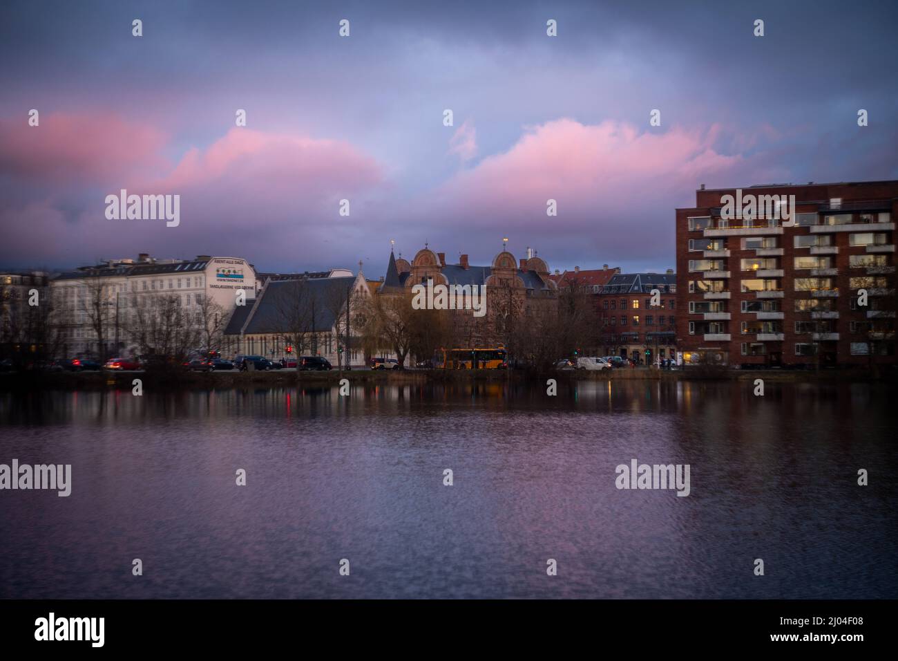 Buildings and river at sunset in Copenhagen, Denmark Stock Photo - Alamy