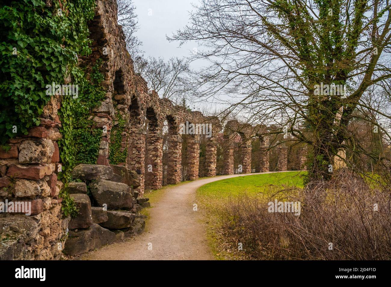 Great view of the gravel walkway along the artificial ruins of the ...