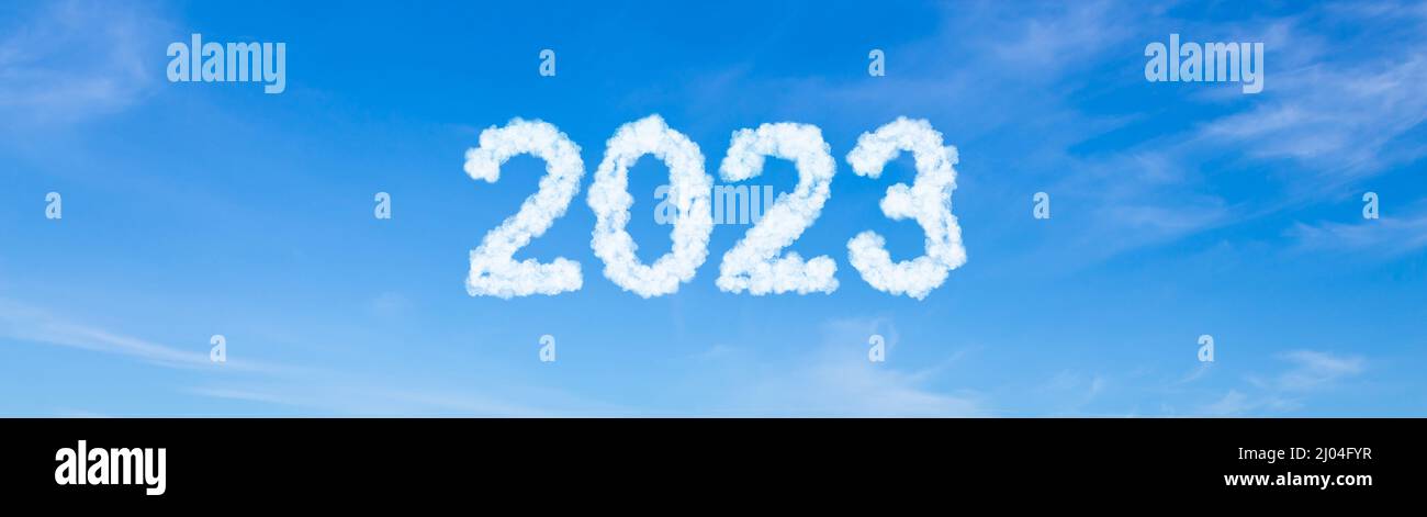 Year 2023 word made of clouds on blue sky background Stock Photo - Alamy