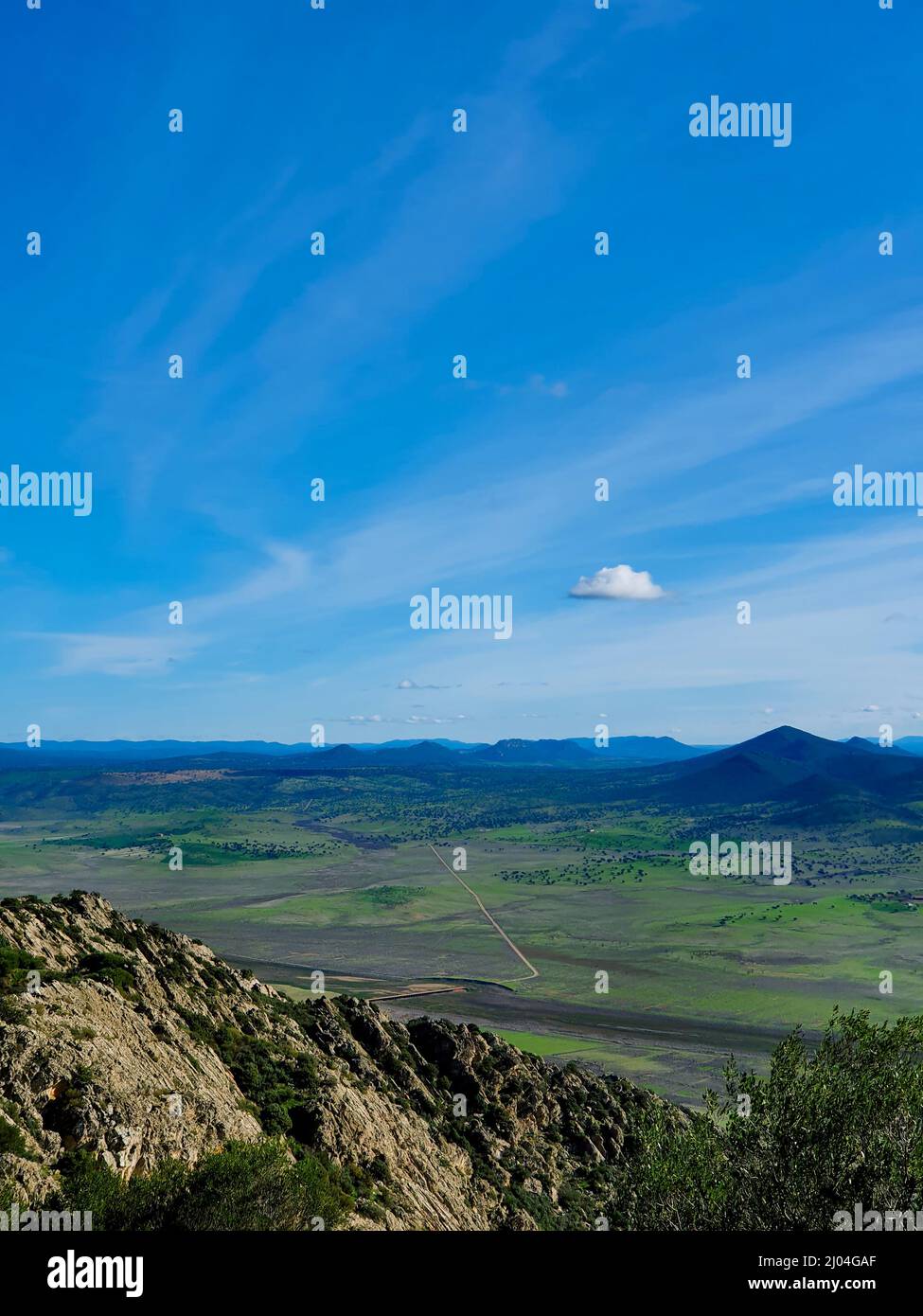 Vertical photograph of a rural landscape from high with rocks and a ...