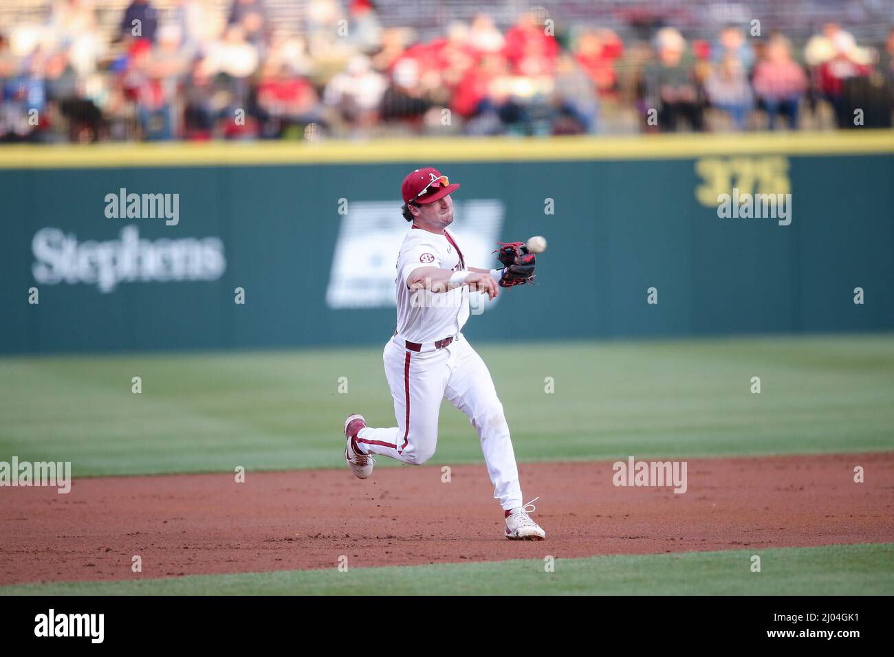 March 15, 2022: Arkansas third baseman Cayden Wallace #7 makes a throw ...