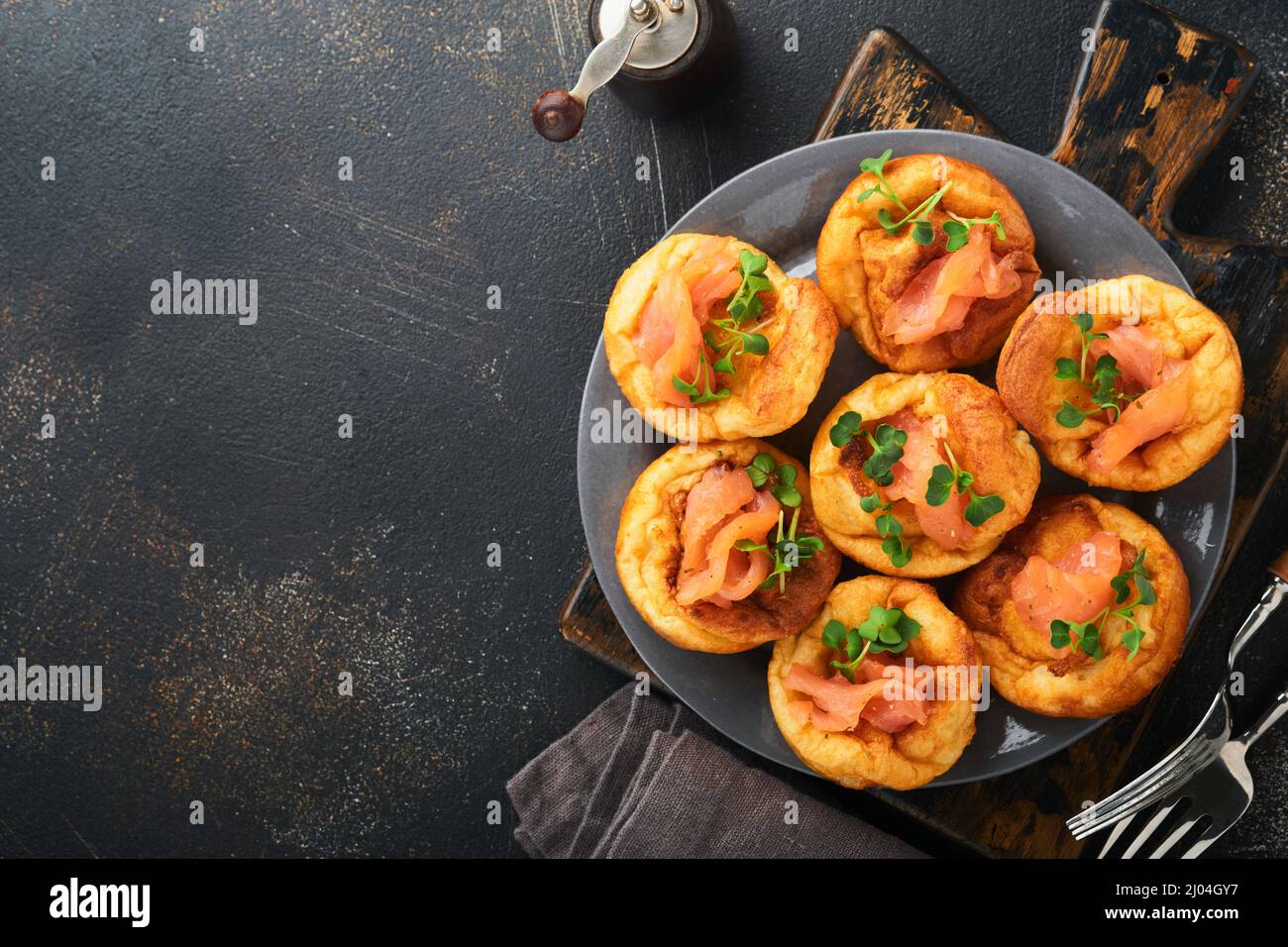 Yorkshire pudding. Traditional English Yorkshire pudding with salmon ...