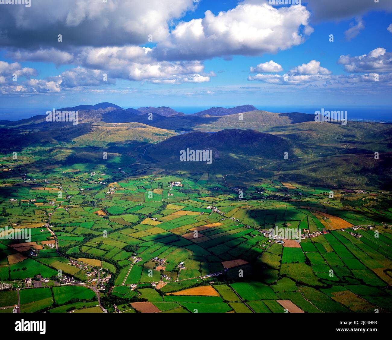 Aerial overlooking Hilltown and the Mourne Mountains in County Down ...