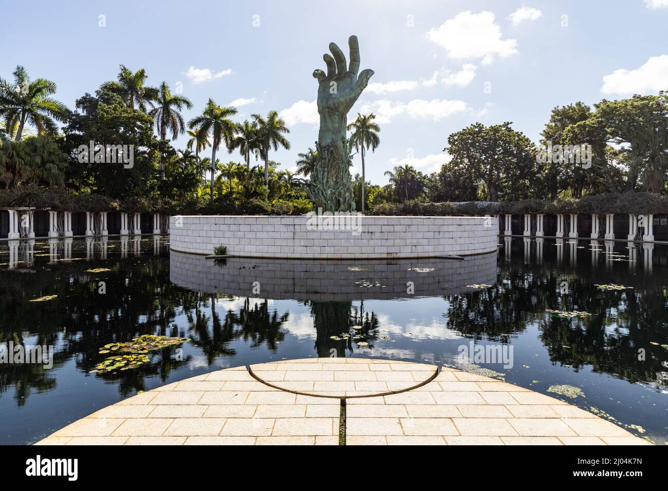 The Holocaust Memorial in Miami Beach features a reflection pool with a ...