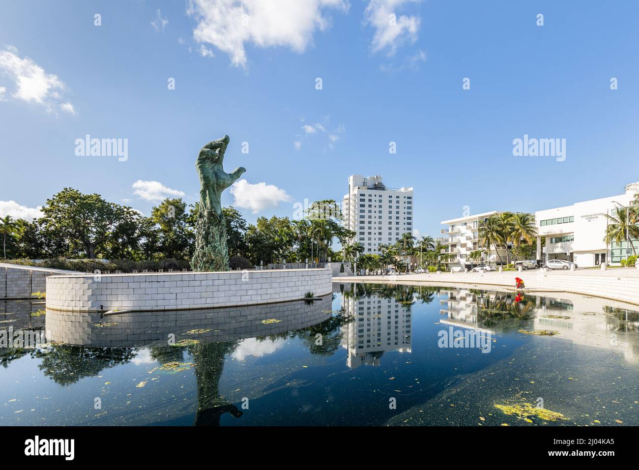 The Holocaust Memorial in Miami Beach features a reflection pool with a ...