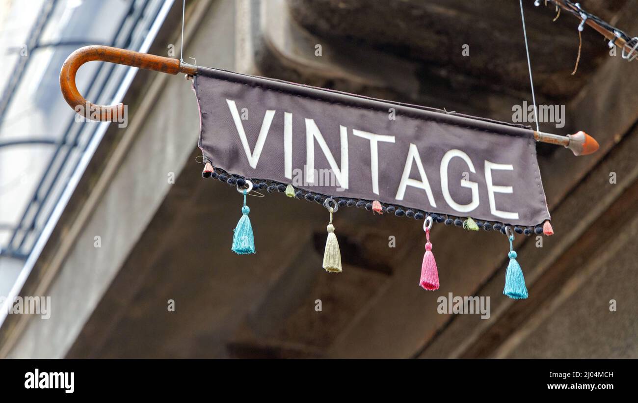 Hanging Umbrella Handle Vintage Shop Direction Sign Stock Photo - Alamy