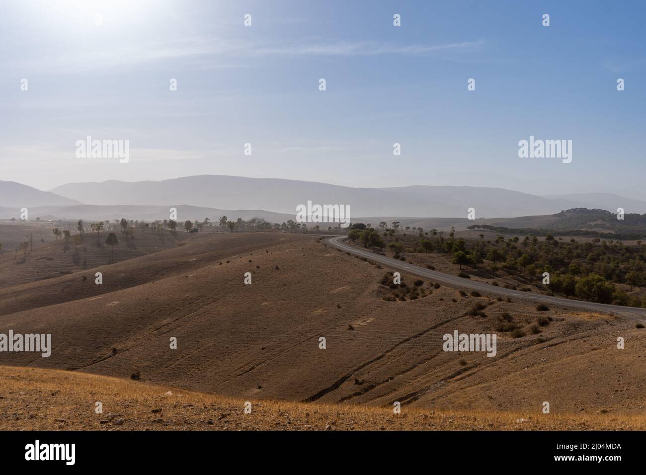 A beautiful view of a desert landscape surrounded by Atlas Mountains ...