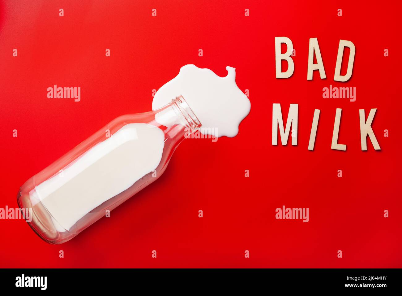 bad milk text word lactose intolerance allergy. milk splatter. avoid ...