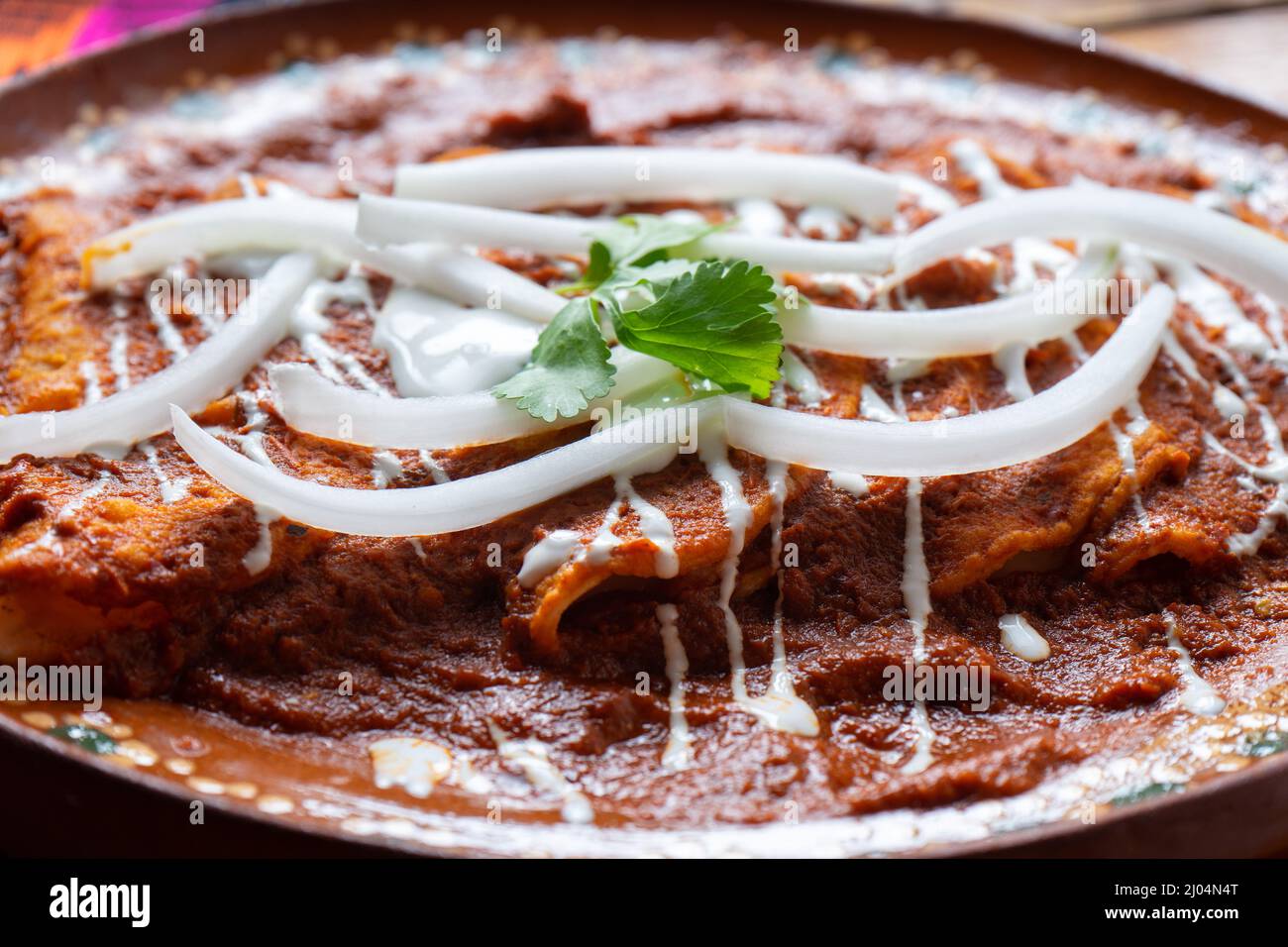 Traditional mexican red enchiladas Stock Photo - Alamy