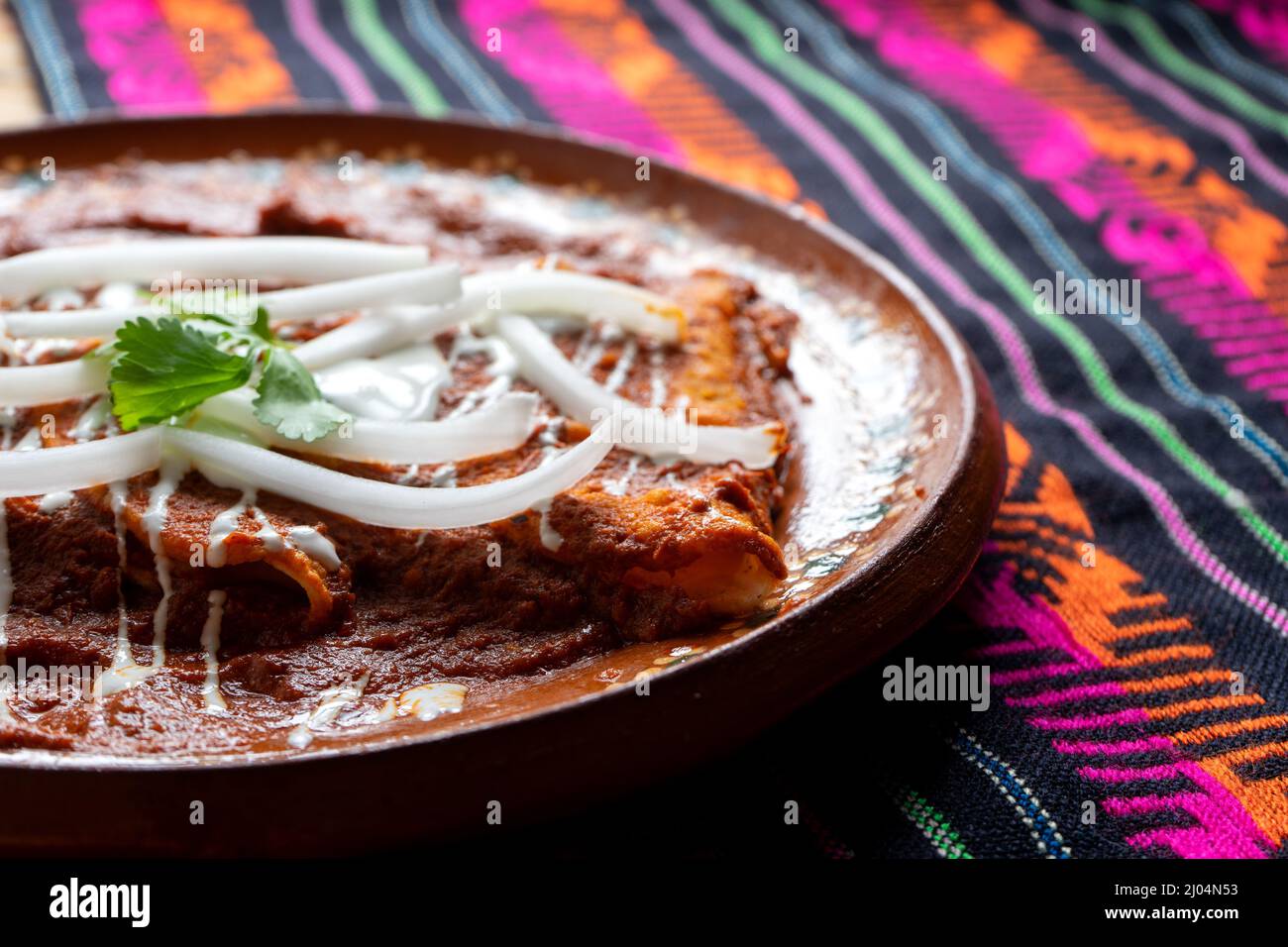Traditional mexican red enchiladas Stock Photo - Alamy