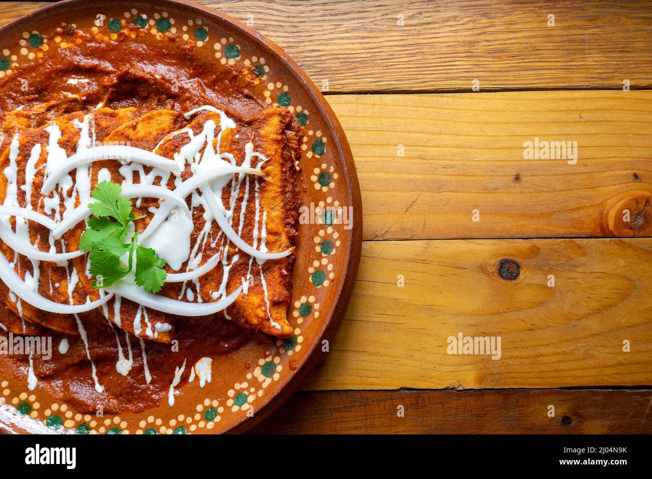 Traditional mexican red enchiladas Stock Photo - Alamy