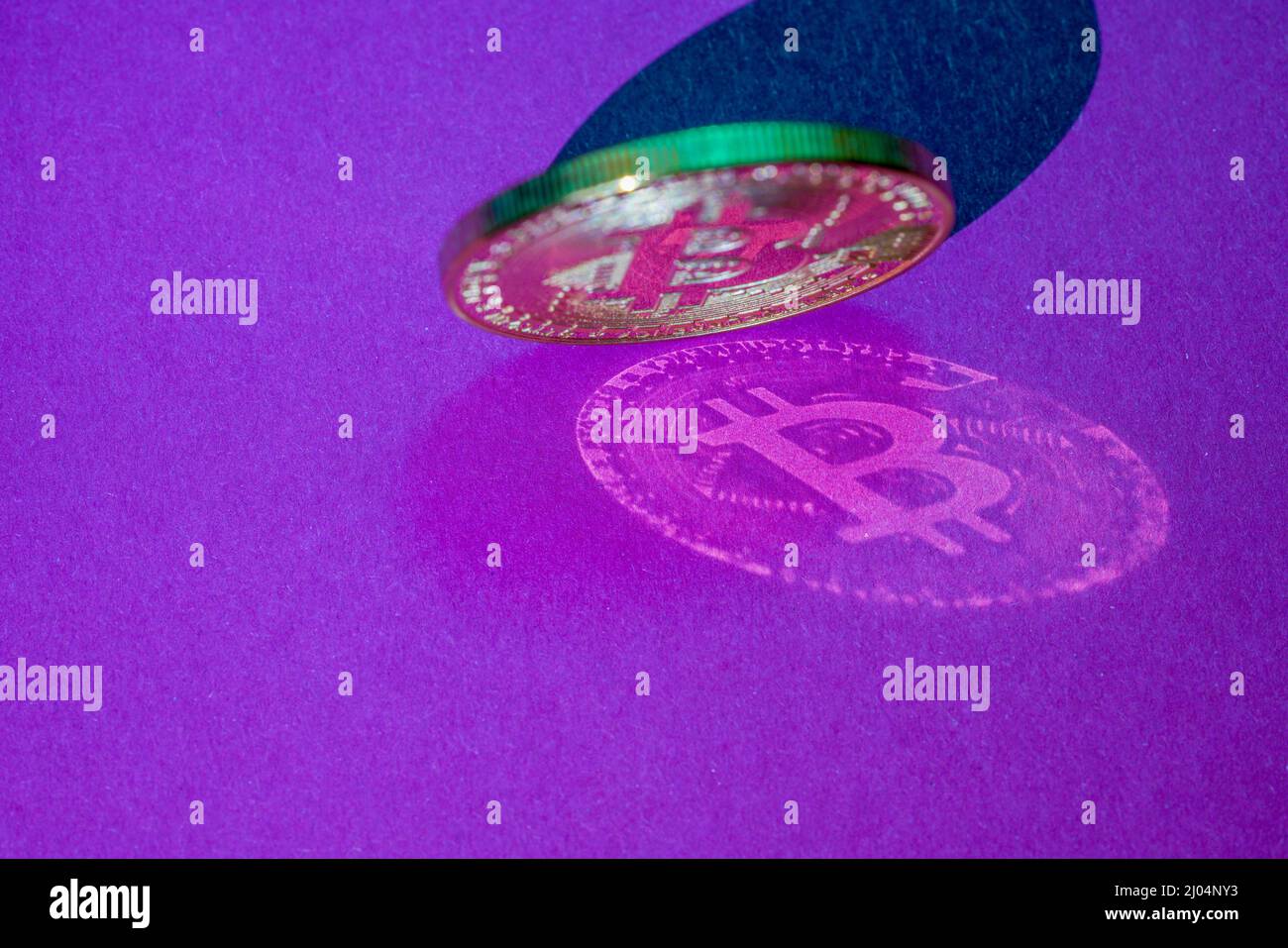 Bitcoin coin, medal photographed in the studio with long exposure ...