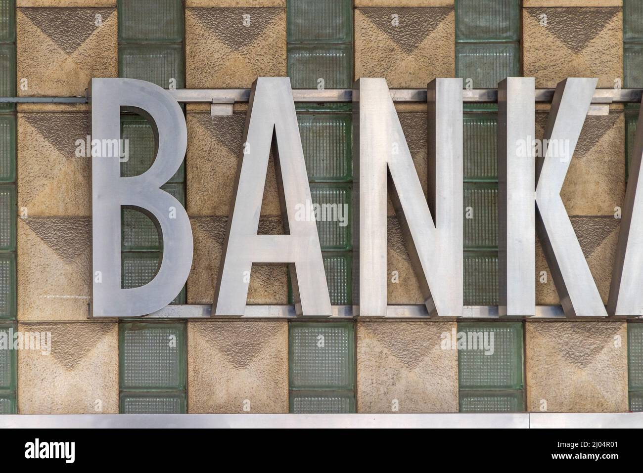 Big Silver Sign Bank at Office Building Wall Stock Photo - Alamy