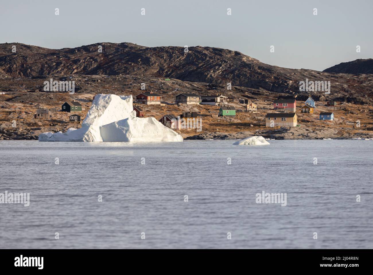 tipical artic town surrounded by big icebergs Stock Photo - Alamy