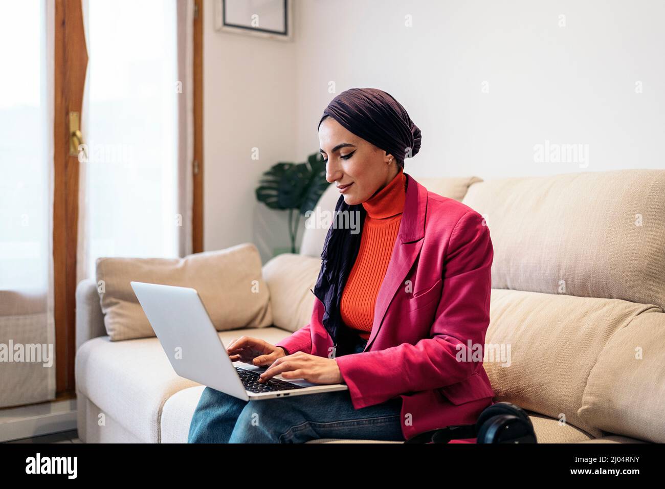 Muslim Woman working From Home Stock Photo - Alamy