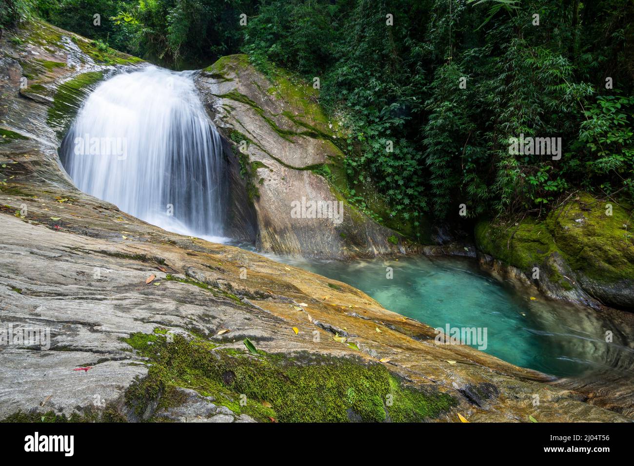 Beautiful view to green atlantic rainforest waterfall with blue water ...