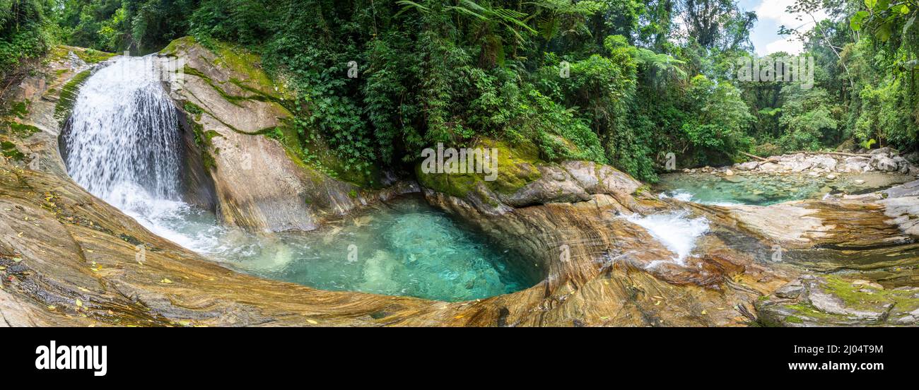 Beautiful view to green atlantic rainforest waterfall with blue water ...