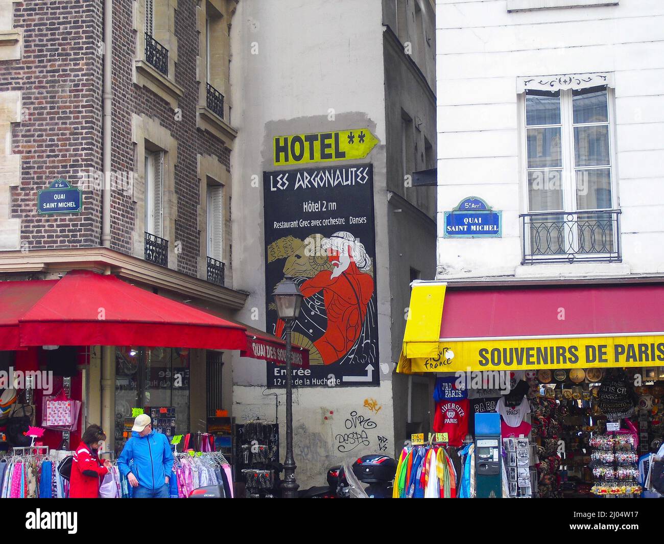 Busy market corner with graffiti in Paris, France Stock Photo - Alamy