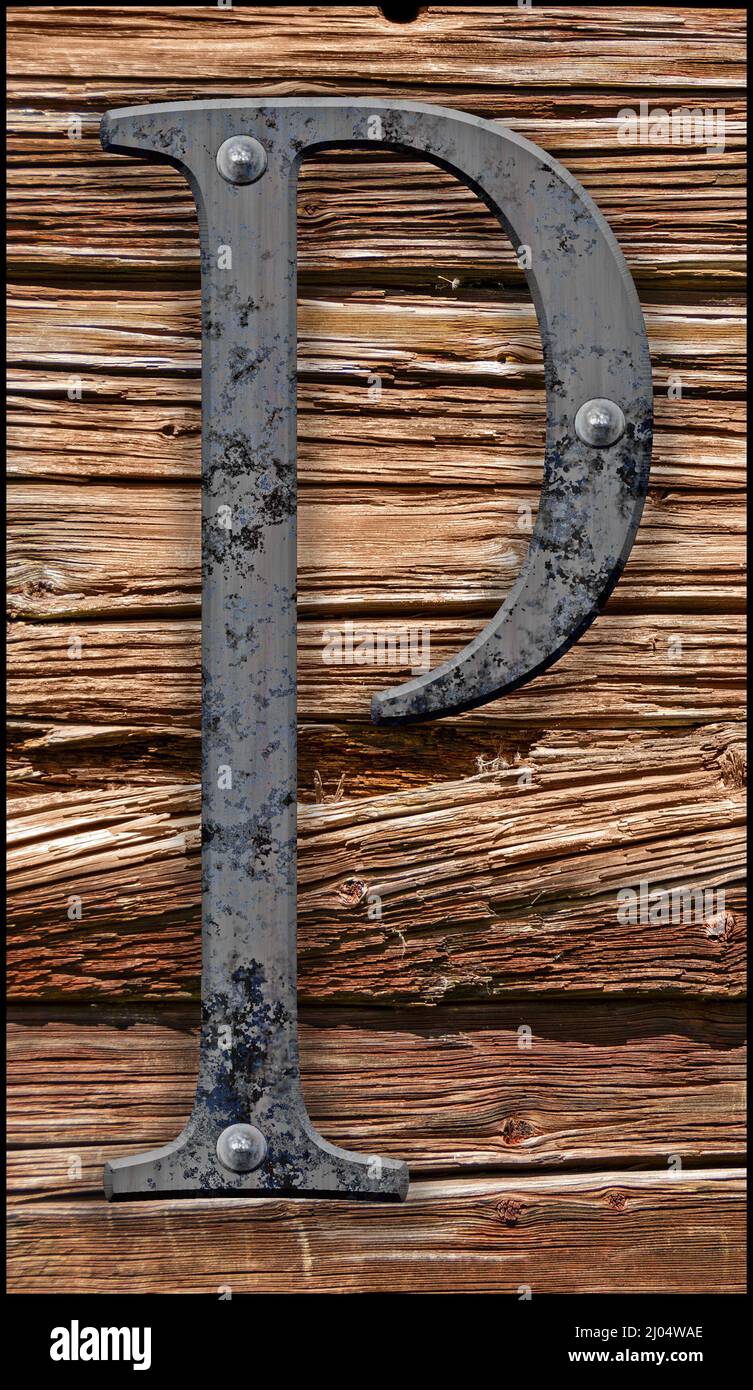 Iron letter P on old wood Stock Photo - Alamy