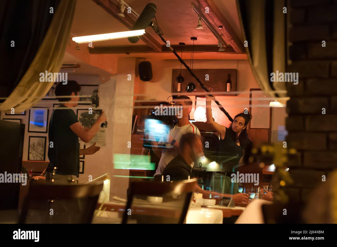 Behind the scenes. Film crew team, cameraman and sound technician ...