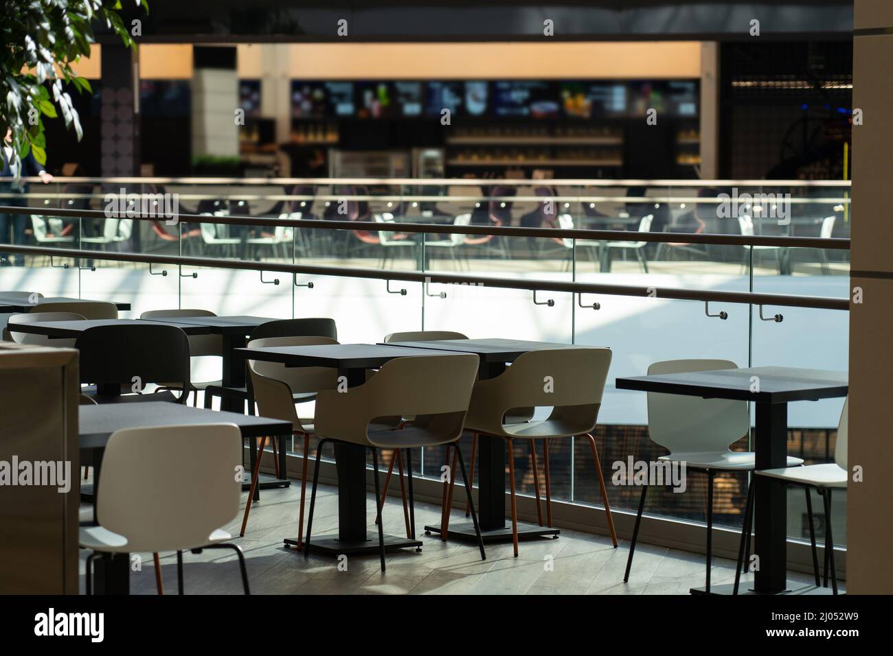 Interior of wooden table in food court shopping mall. Food center in ...