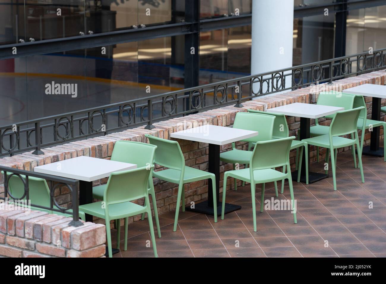 Interior of wooden table in food court shopping mall. Food center in ...