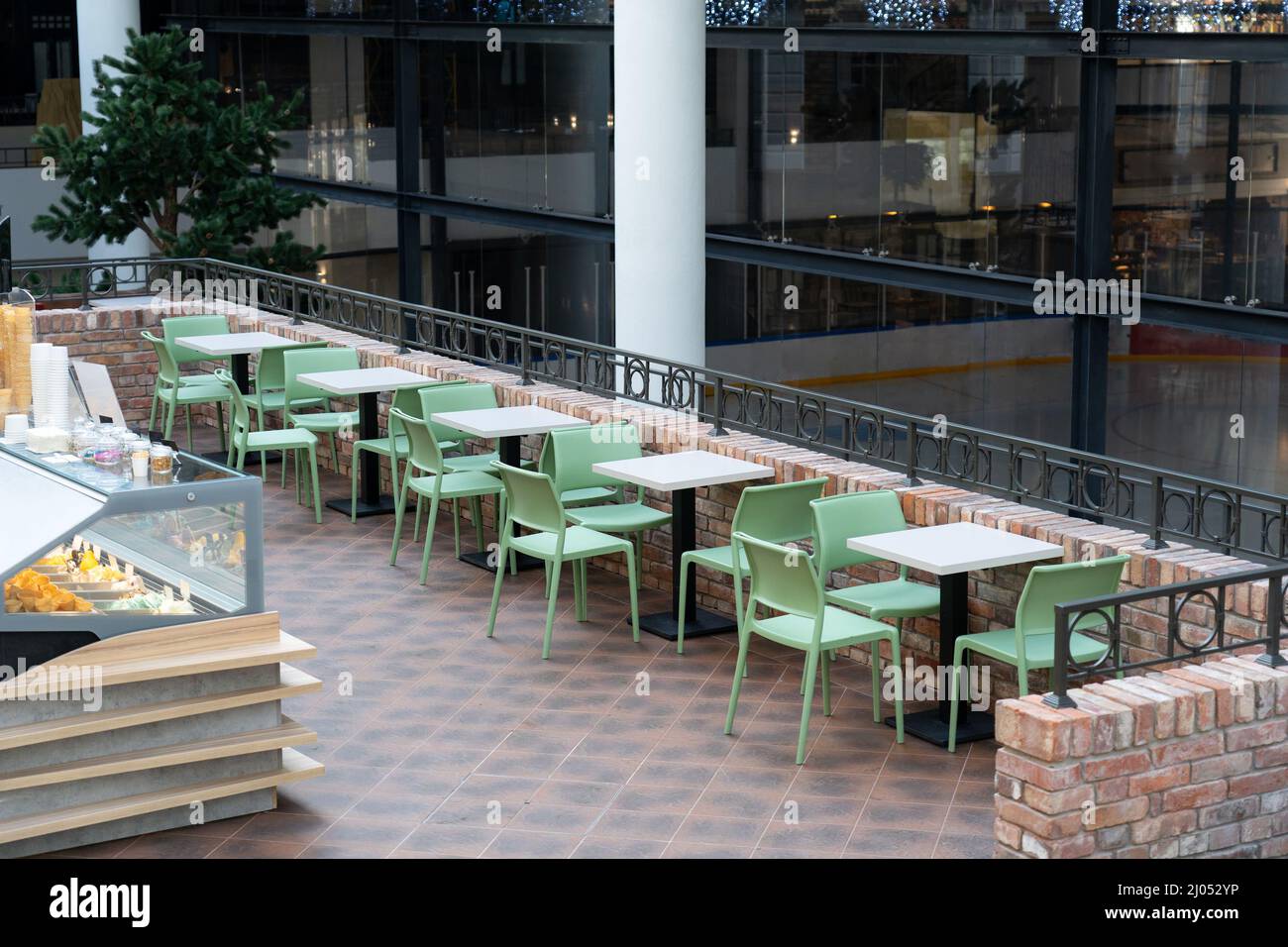 Interior of wooden table in food court shopping mall. Food center in ...