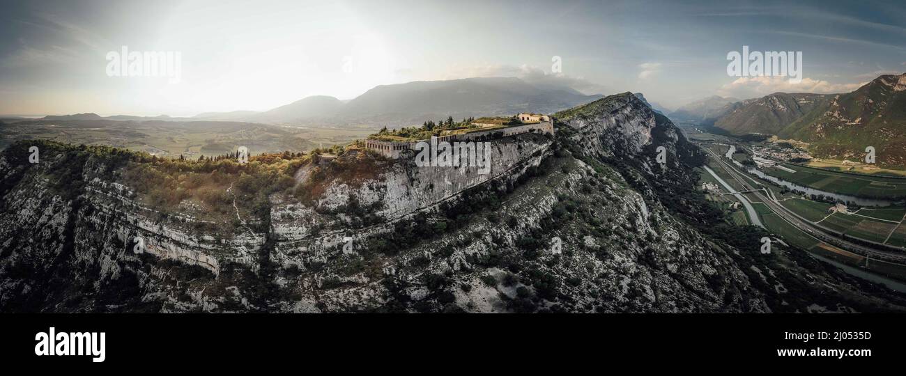 Drone shot of the mountain range of Monte Baldo, Italy under a bright ...