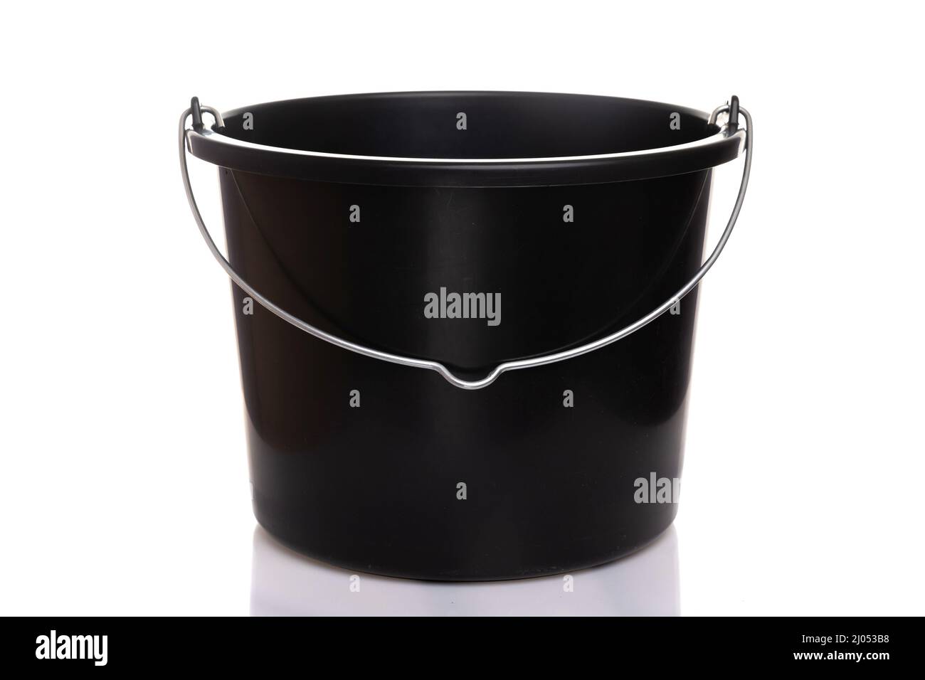 Black plastic construction bucket with a metal thin handle on a white ...