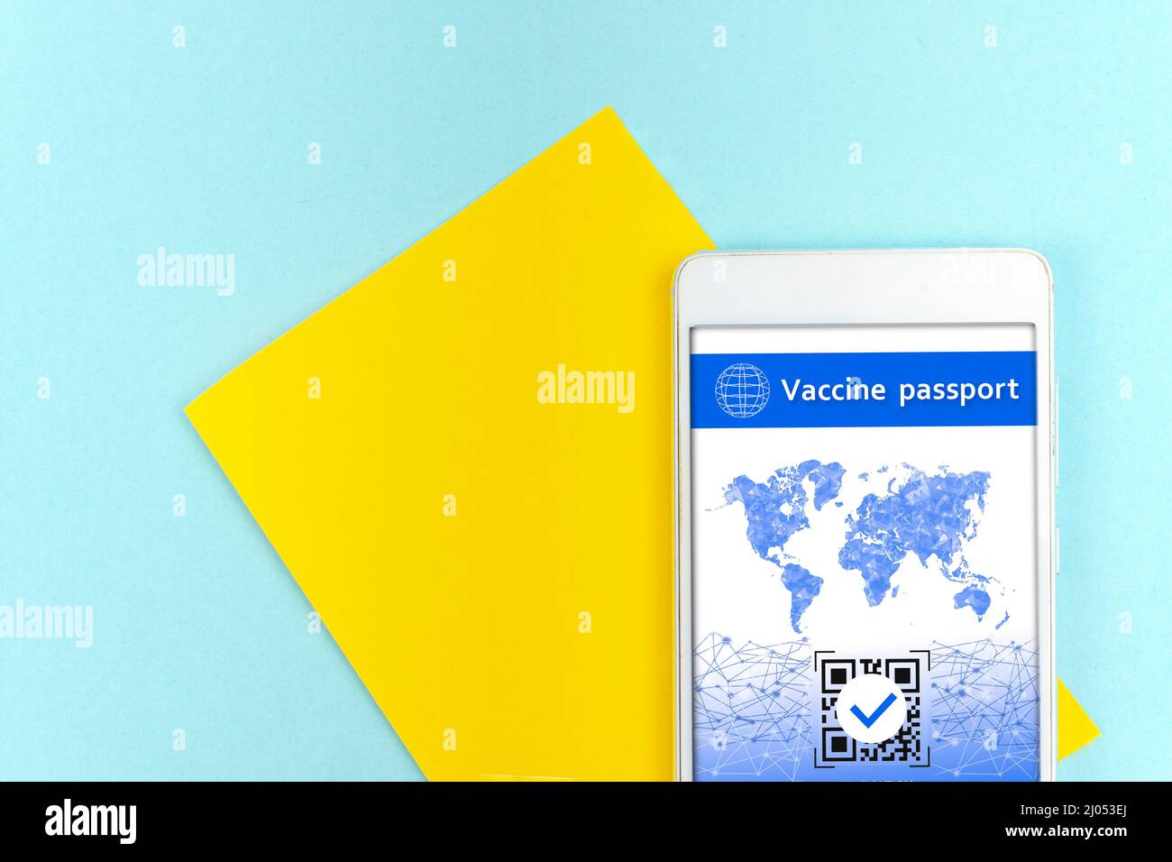 Yellow a piece of paper with Smartphone displaying valid digital ...