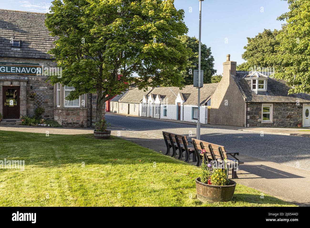 Evening light on traditional buildings on Main Street at Tomintoul ...