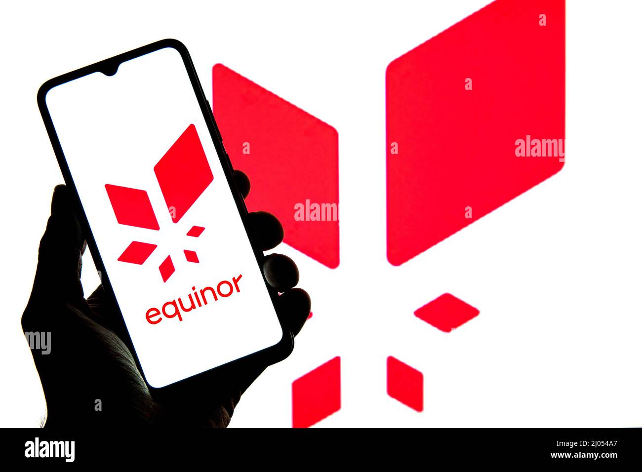 In this photo illustration a Equinor ASA logo seen displayed on a ...