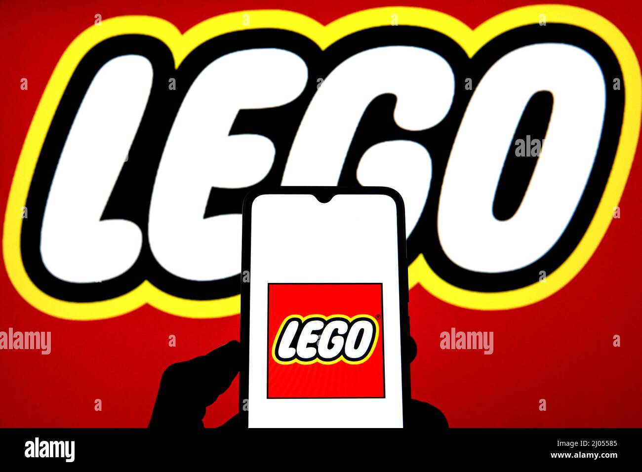 In this photo illustration a LEGO logo seen displayed on a smartphone ...
