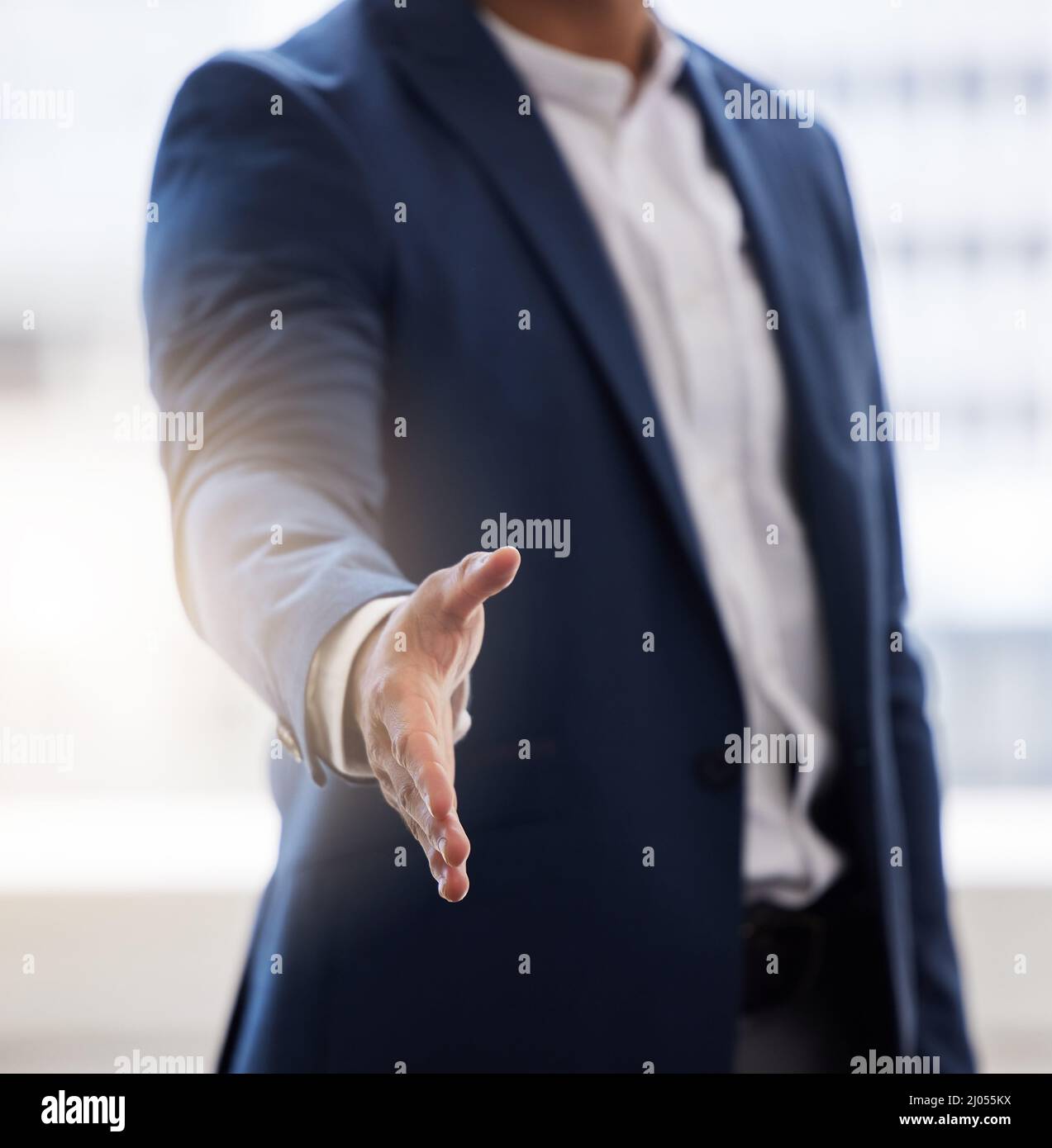 Lets make this happen. Cropped shot of a businessman holding his hand ...