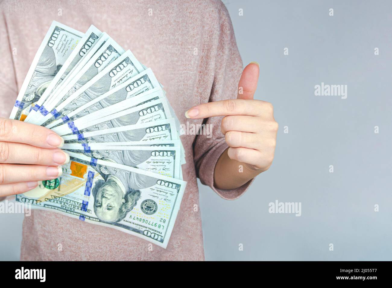 Hand giving paper another hand hi-res stock photography and images - Alamy
