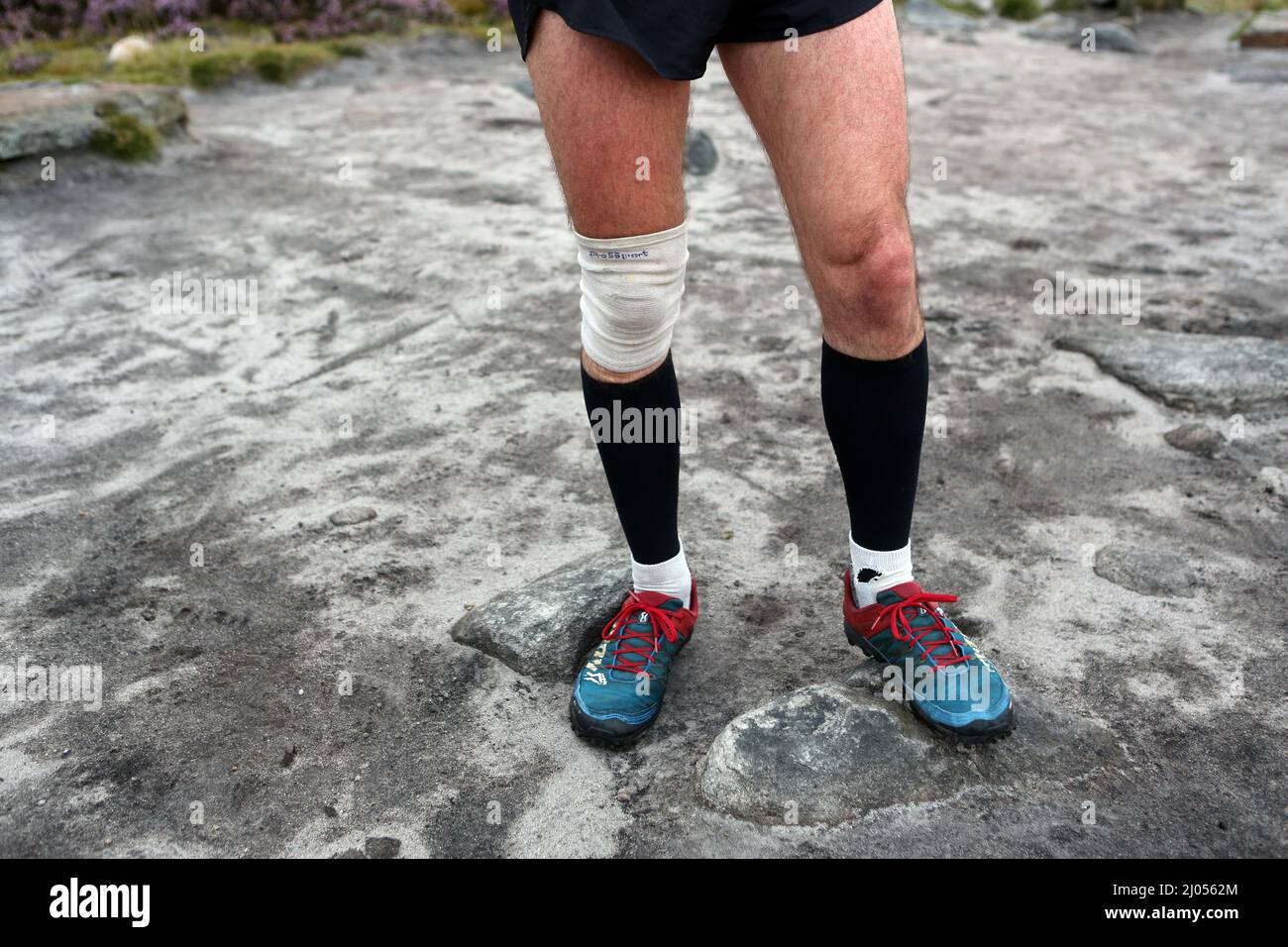 The legs of Michael Ayers who is a Fell runner aged 65. Fell running on ...