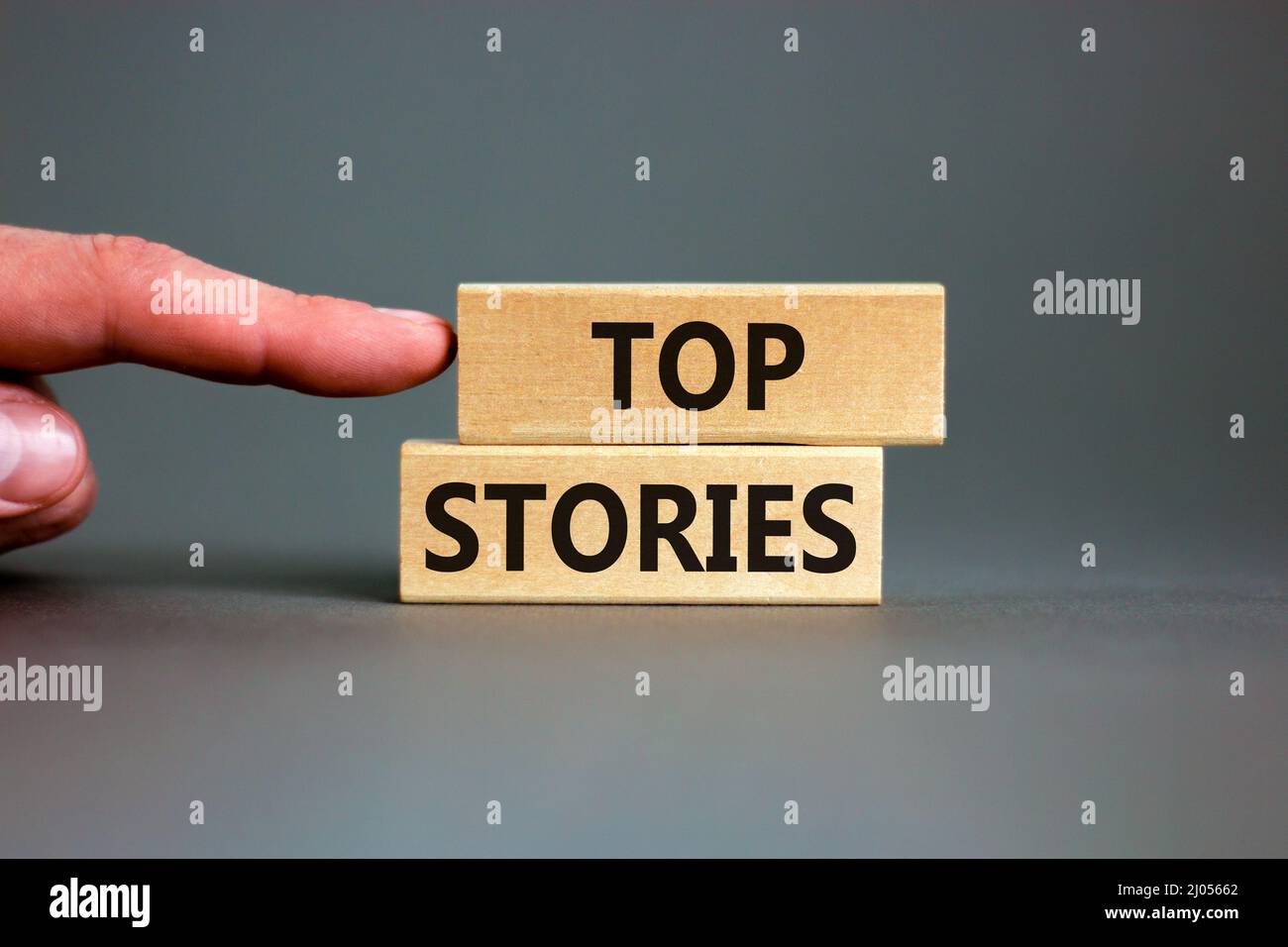 Top stories symbol. Concept words Top stories on wooden blocks on a ...
