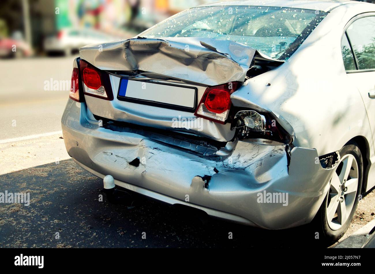 Car crash accident on street with wreck and damaged car Stock Photo - Alamy