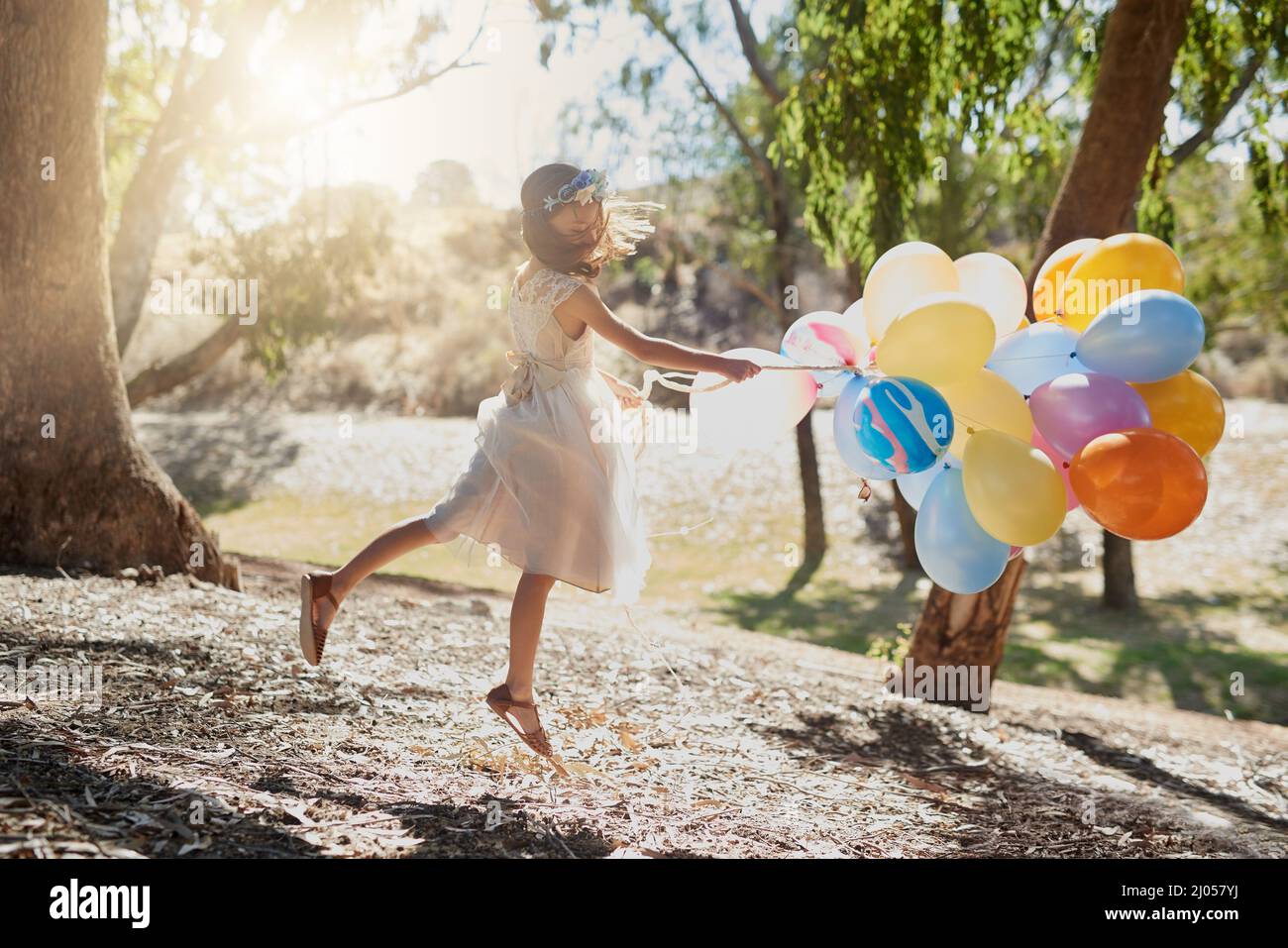 Child flying away balloon hi-res stock photography and images - Alamy