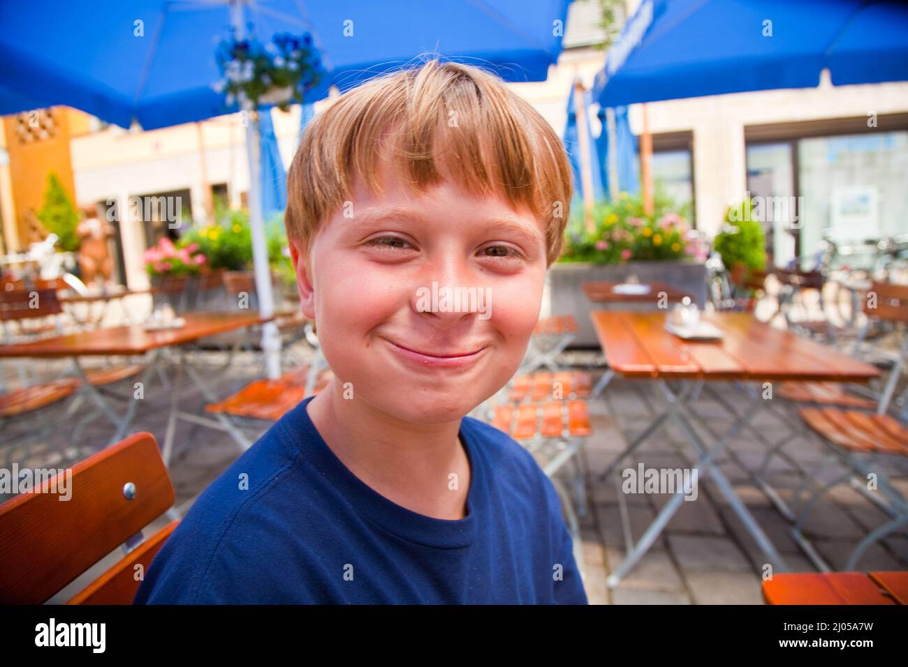 happy child smiles with full mouth and looks boldfaced and laughs Stock ...