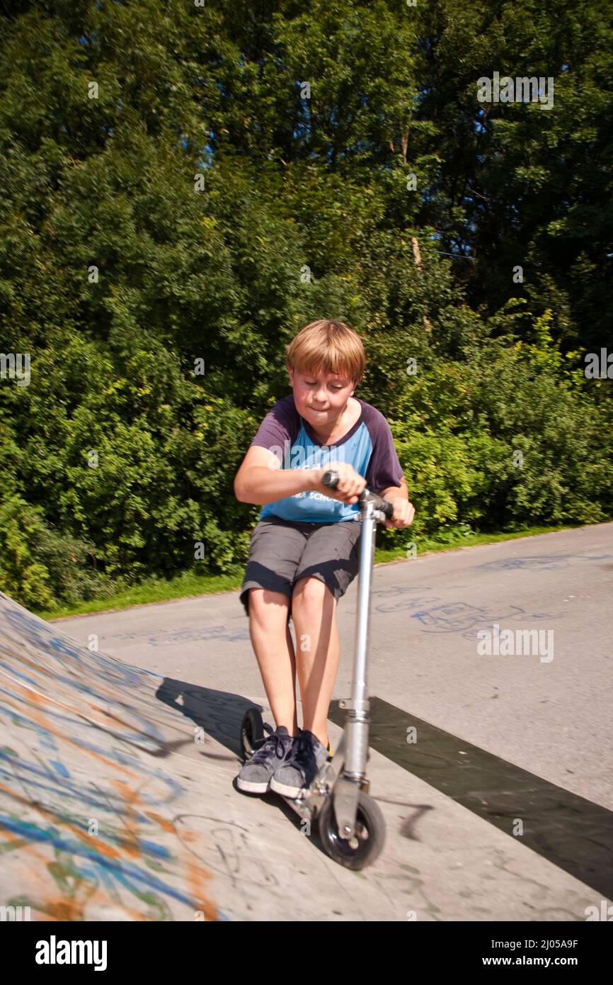 Scooting hi-res stock photography and images - Alamy