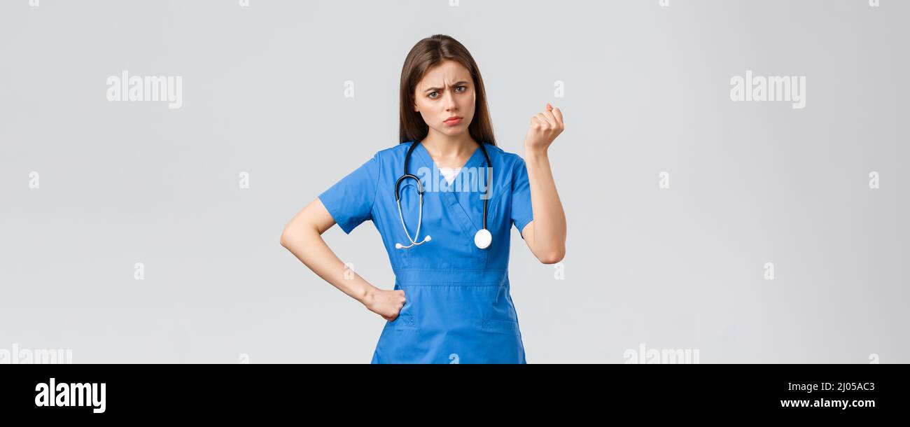 Medical workers, healthcare, covid-19 and vaccination concept. Angry ...