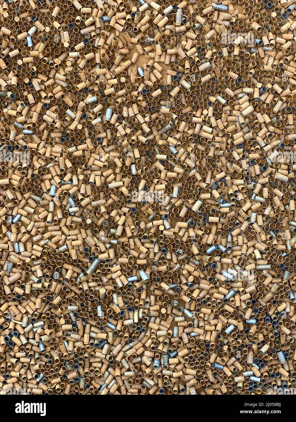 Background of many used pistol bullet shells Stock Photo - Alamy