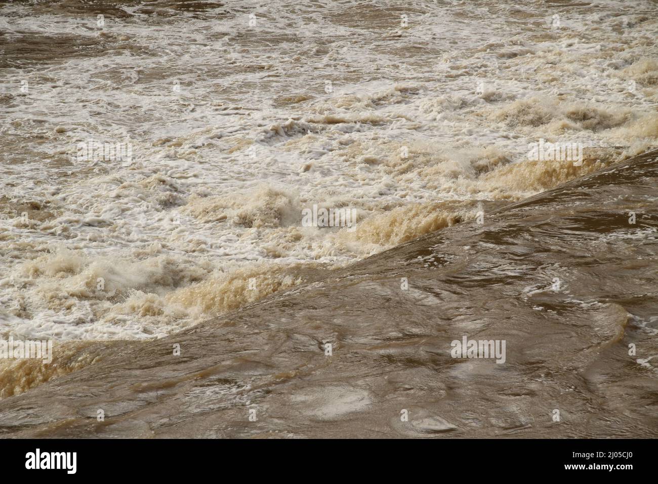 Cascade on a river with foamy water Stock Photo - Alamy