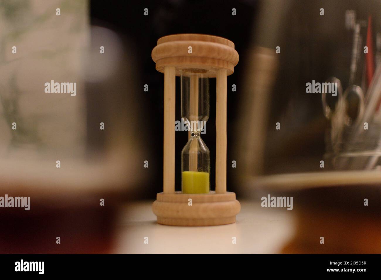 Photo of sand watches with yellow sand Stock Photo - Alamy