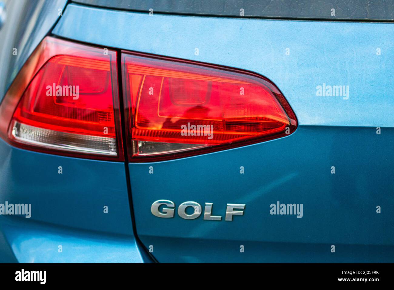 Close up photo of modern and clean car, detail of back light, tail ...