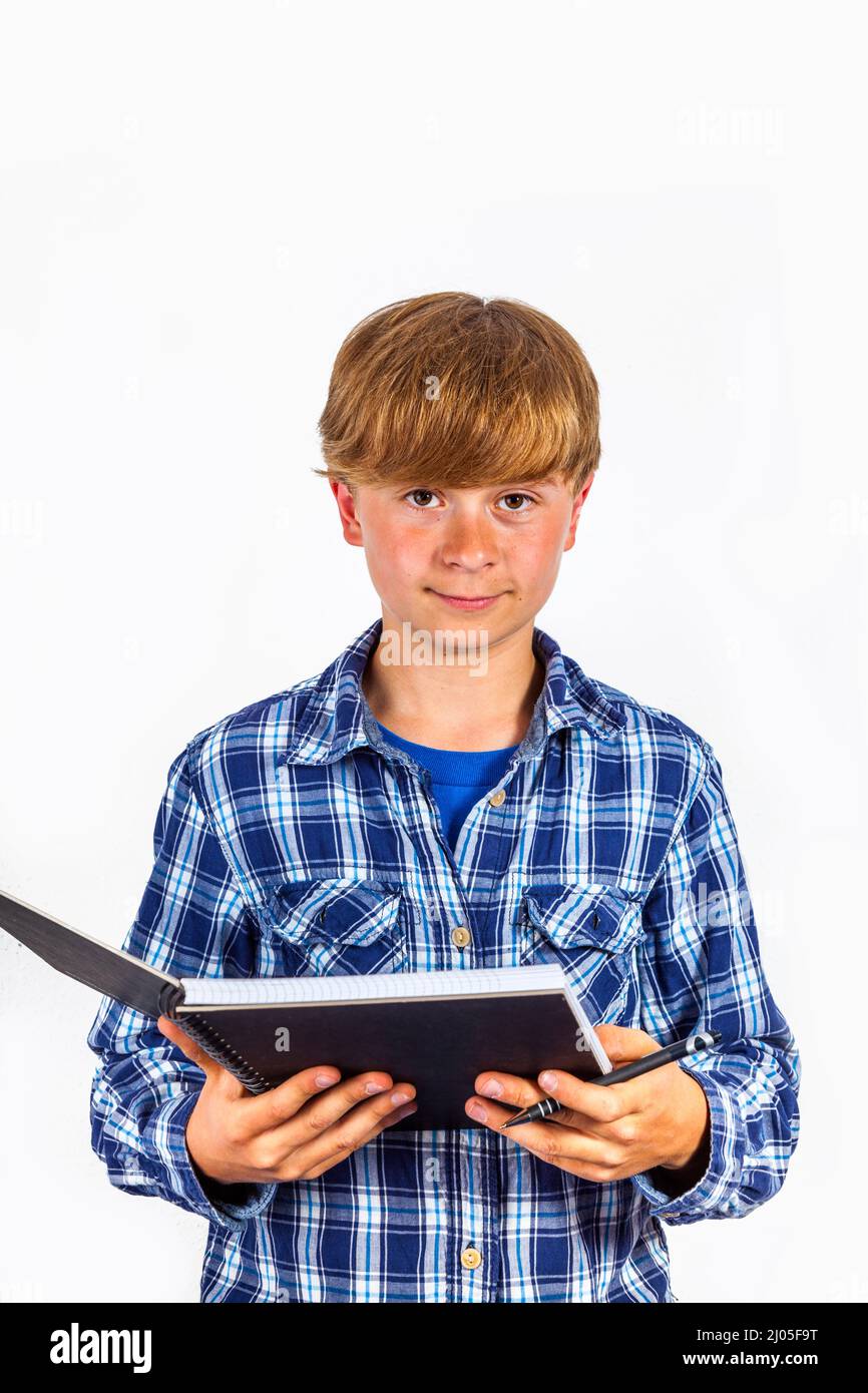 happy smart boy is reading in a book Stock Photo - Alamy