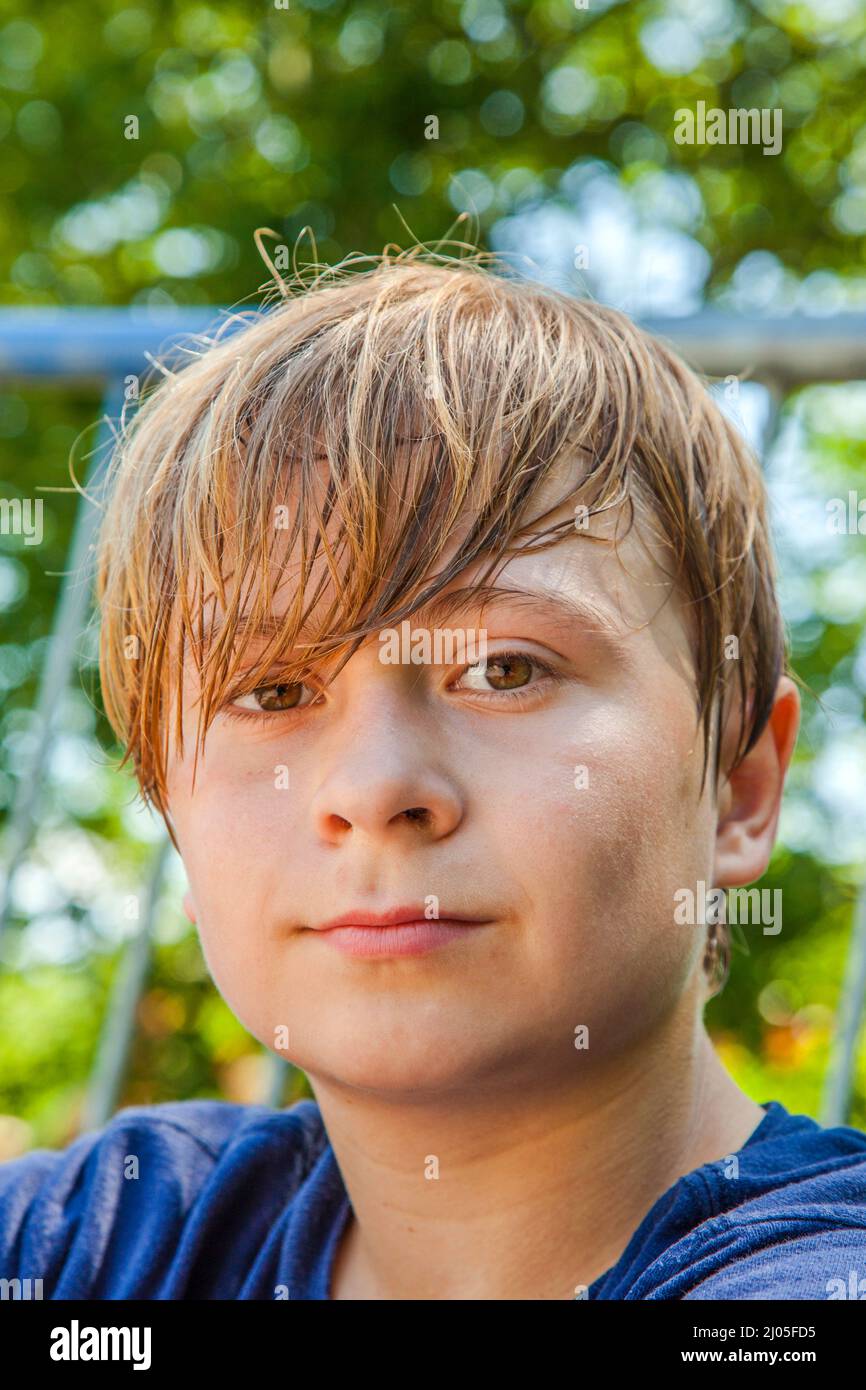 young boy sweating and exhausted from sports Stock Photo - Alamy